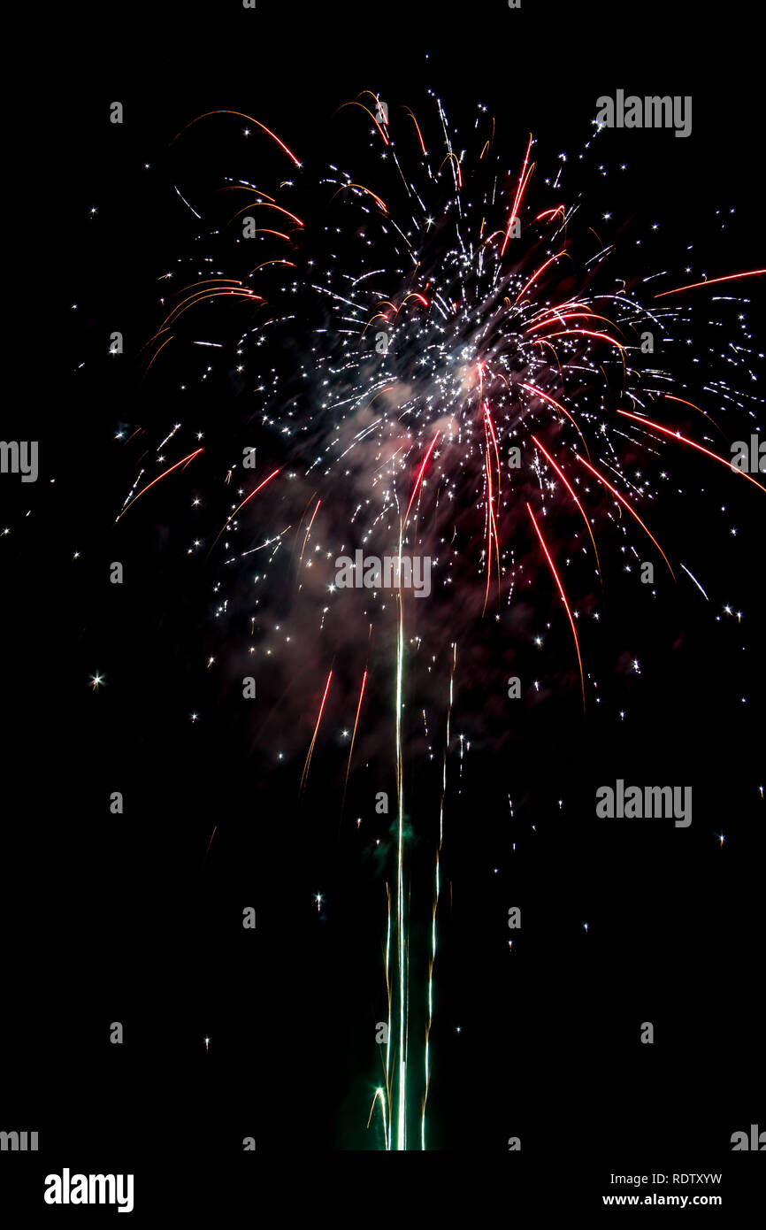 populous festive fireworks outside the city in the summer camp under ...