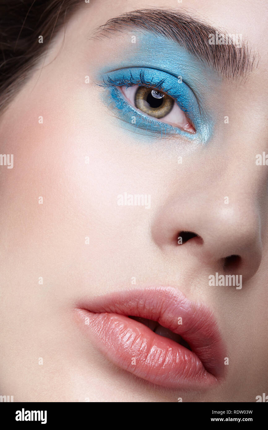 Closeup macro portrait of female face. Human woman half-face with ...