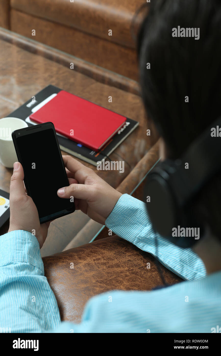 Picture of man is using smartphone in hand and listening music with ...