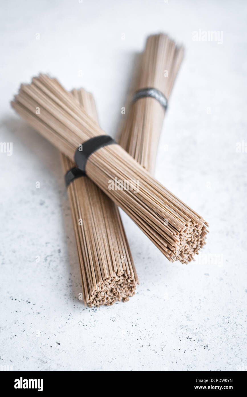 Soba noodles - traditional asian food ingredient. Bundle of buckwheat ...