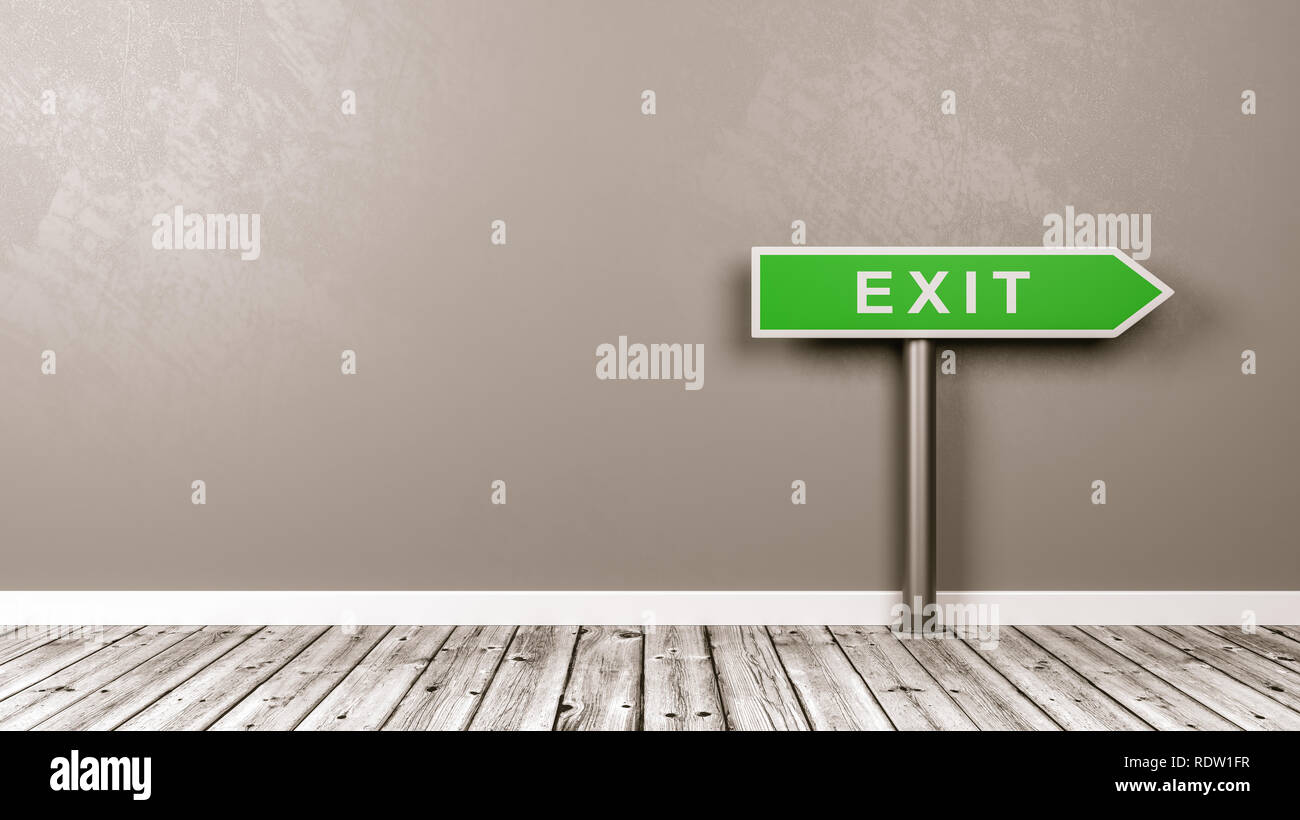 Green Exit Directional Arrow on Wooden Floor Against Gray Wall with ...