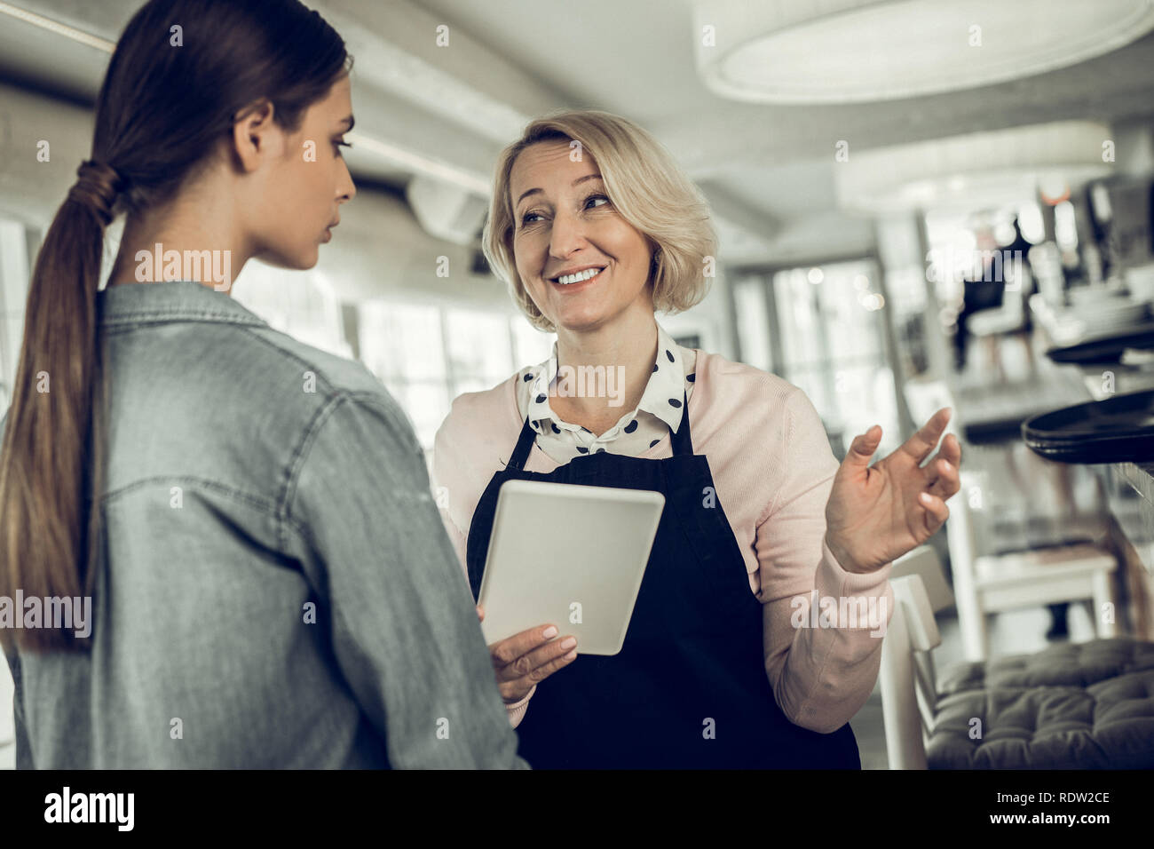Pleasant speaking hi-res stock photography and images - Alamy