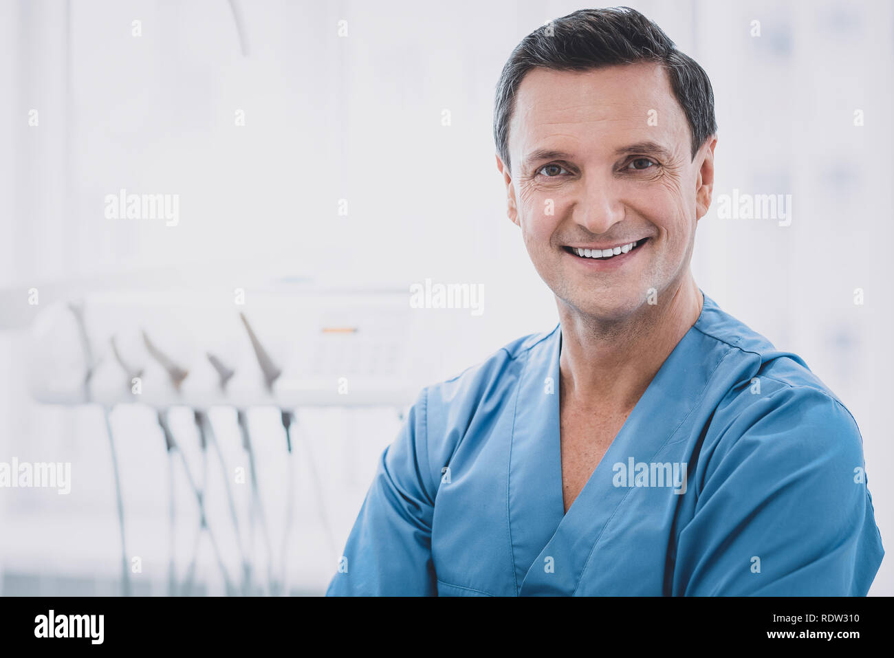 Handsome male person looking straight at camera Stock Photo - Alamy