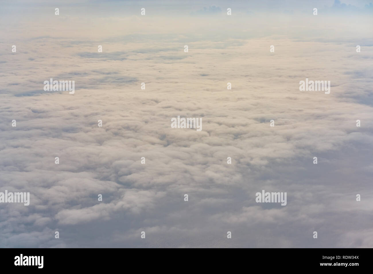 Aerial view of blue sky with clouds from jet flight Stock Photo - Alamy
