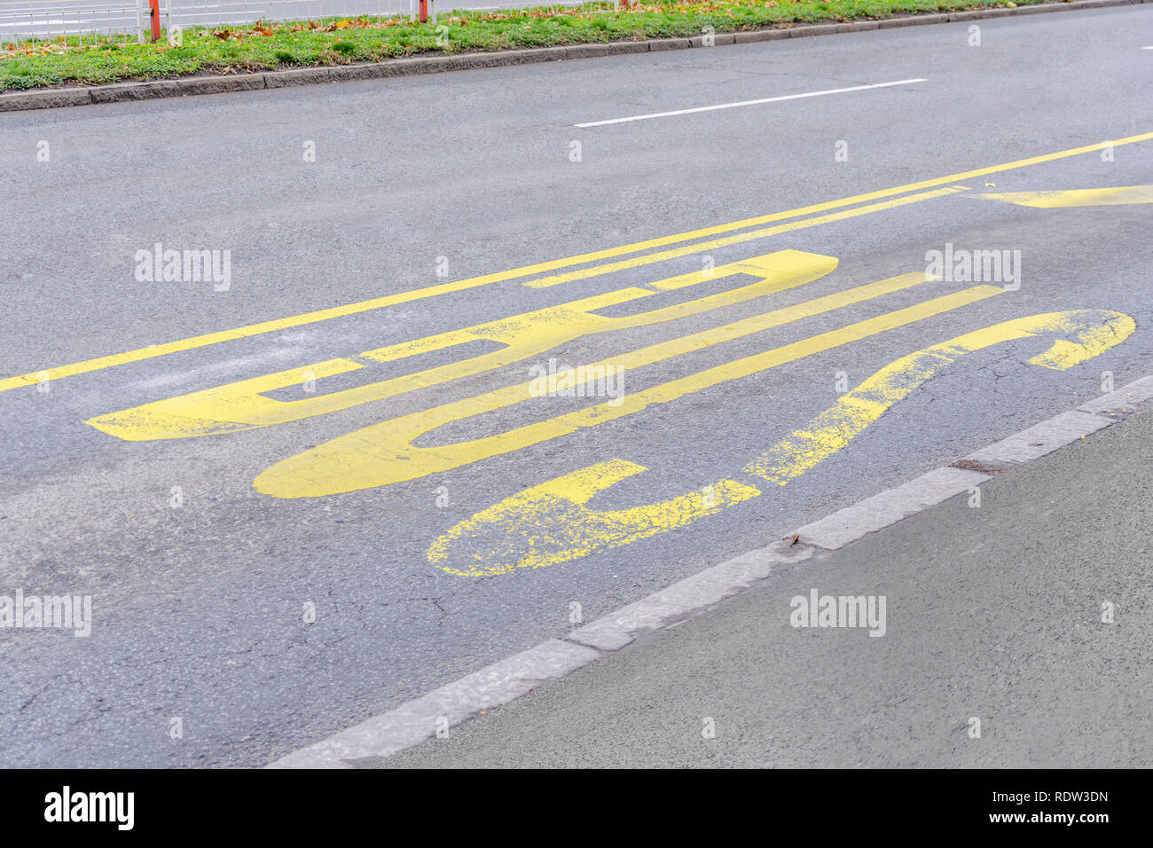 Bus stop sign painted on hi-res stock photography and images - Alamy