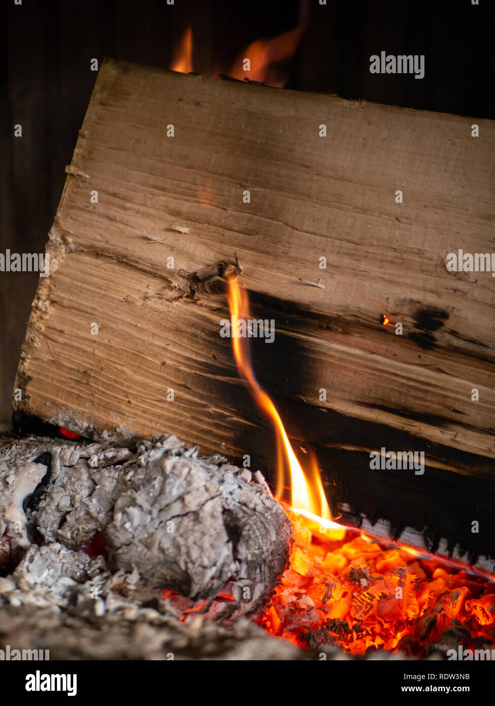 Close-up shot of a log of wood in an oven Stock Photo - Alamy