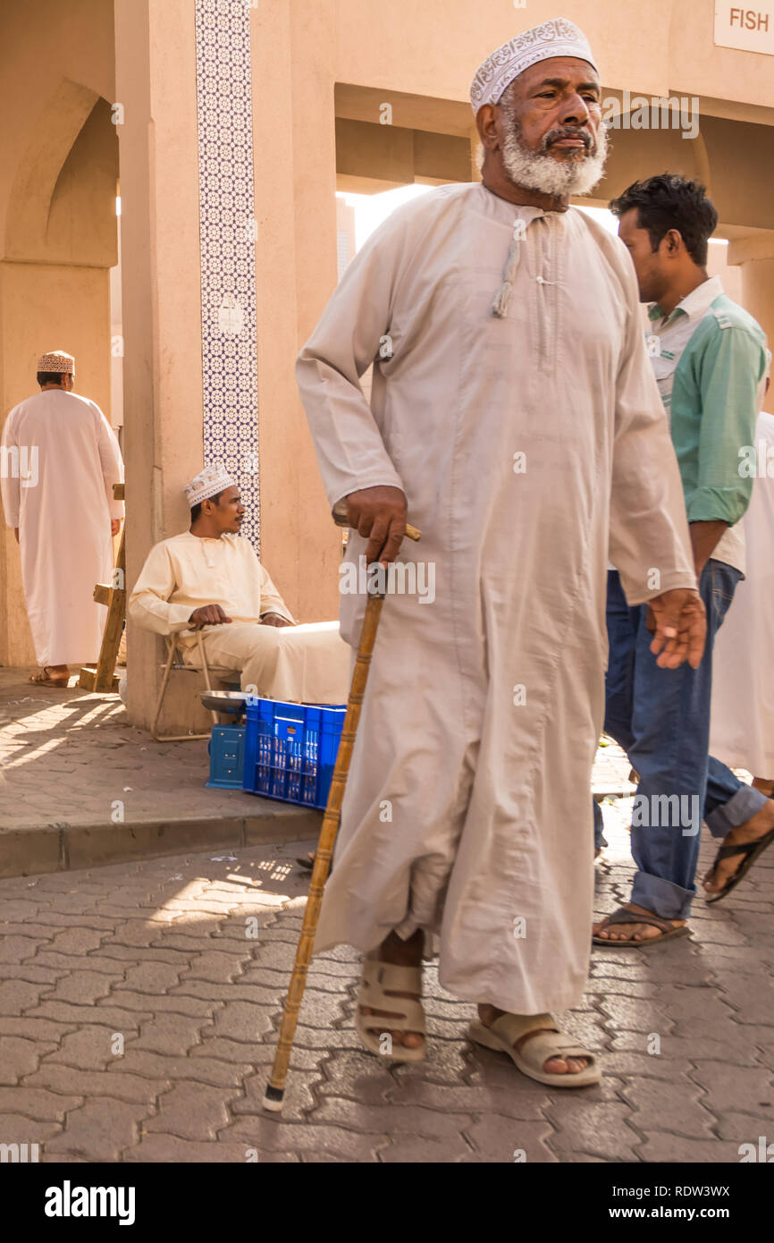 Nizwa, Oman - November 2, 2018: Old man in traditional Omani clothes in ...