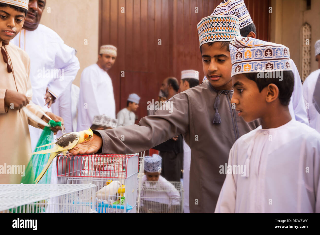 Nizwa, Oman - November 2, 2018: Omani children in traditional clothes ...