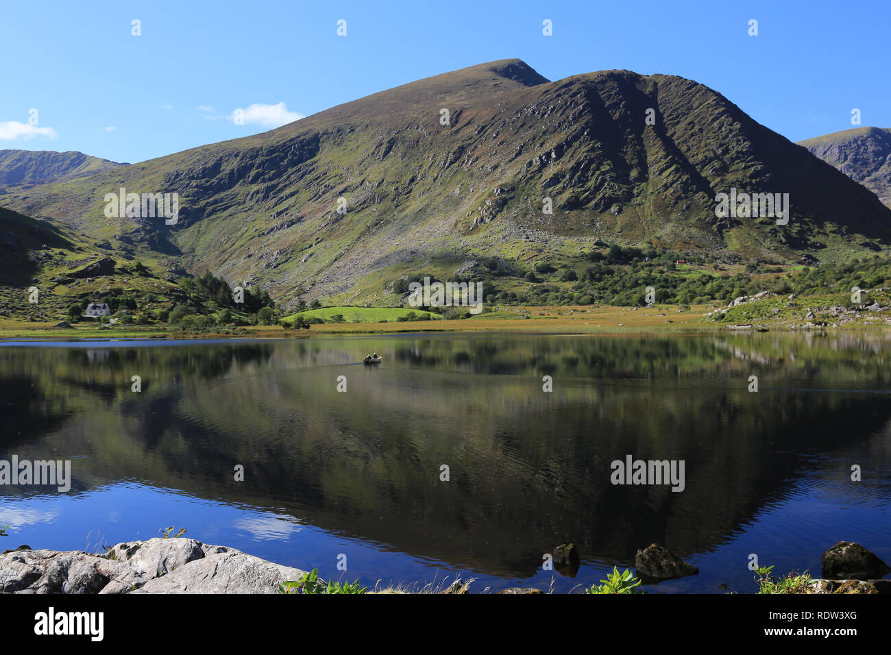 small fresh water lake hidden under irelands highest mountain, black ...