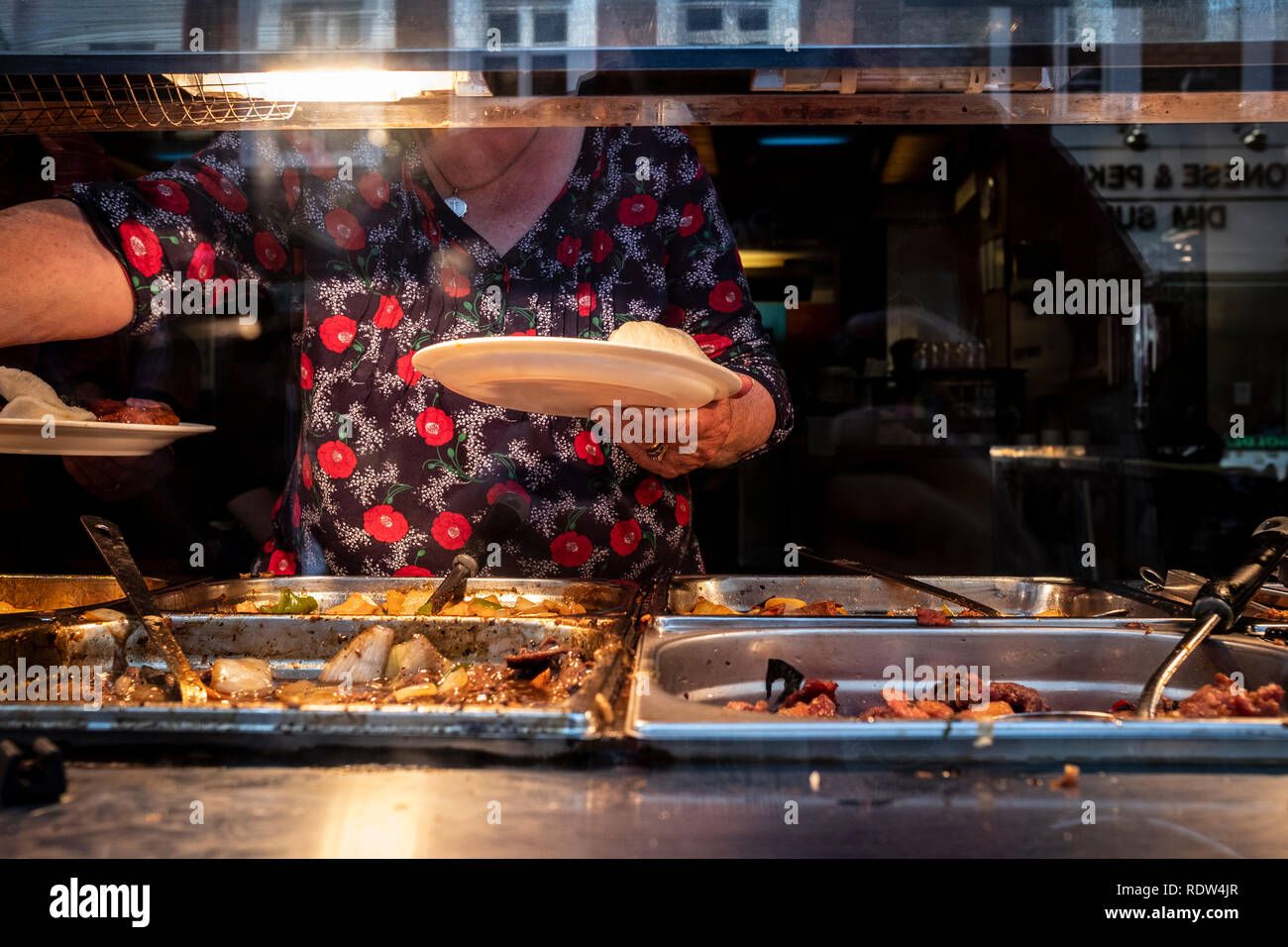 London, England - 10 June 2018: Greasy food at a chinese restaurant ...