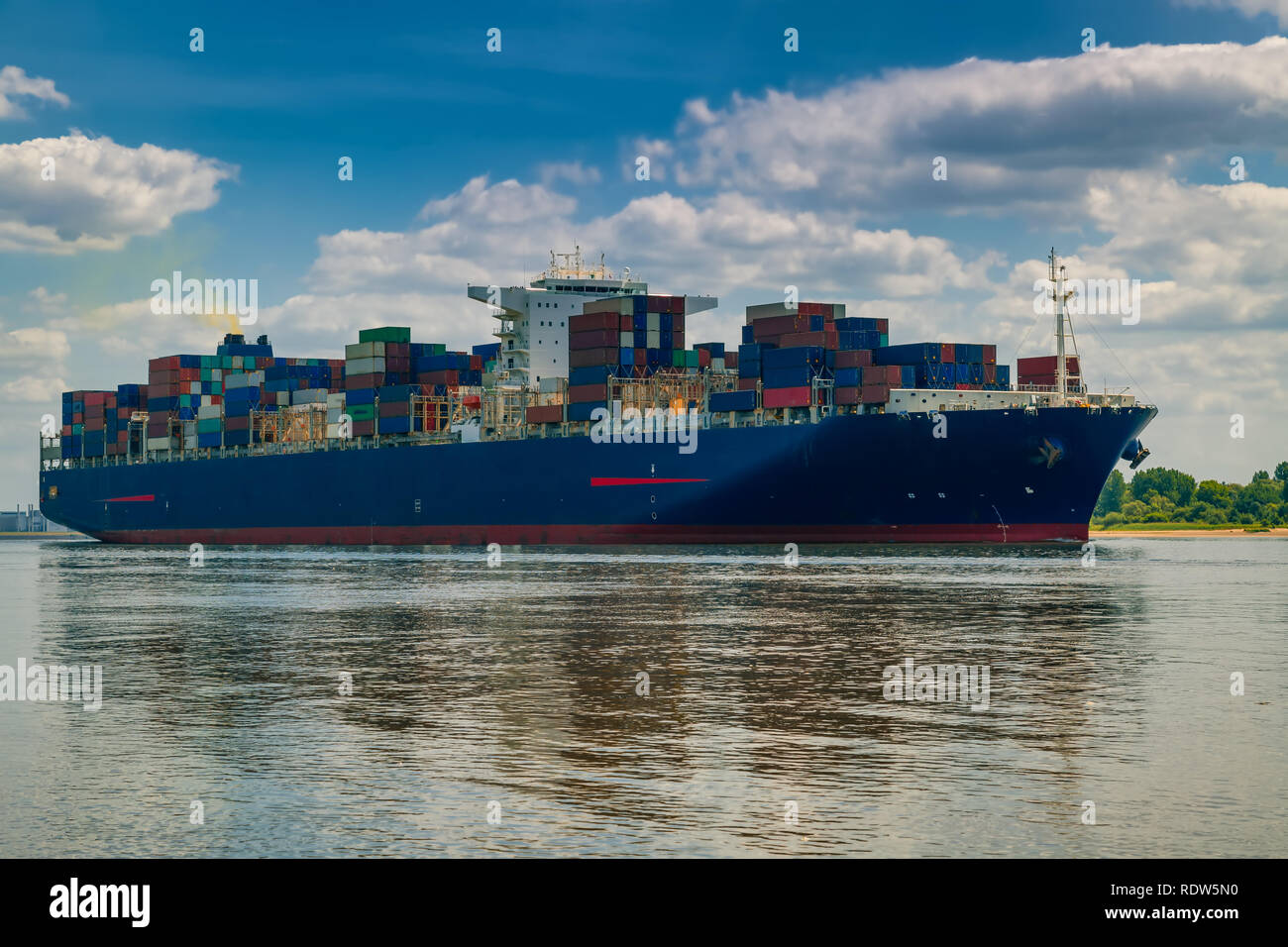 Container ship on the Elbe near Hamburg Stock Photo - Alamy