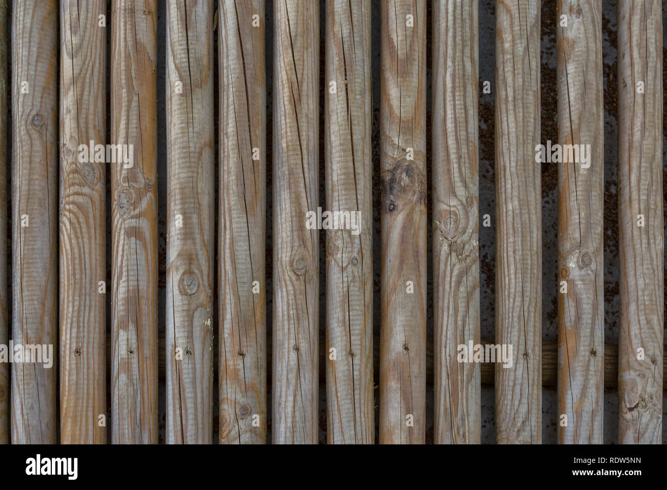 Texture wood piles wooden poles Stock Photo - Alamy