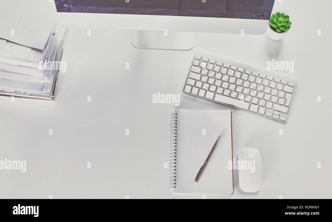 Workspace desktop, documents on the office table Stock Photo - Alamy
