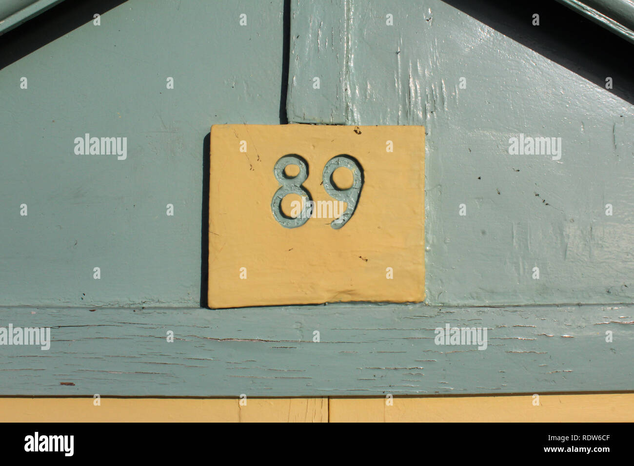 Number 89 sign in wooden hut Brighton, England, close-up Stock Photo ...