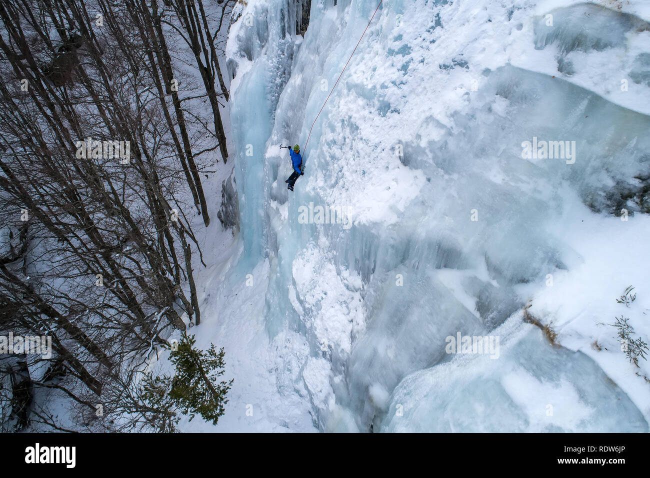 Ice climbing the North Greece, man climbing frozen waterfall Stock ...