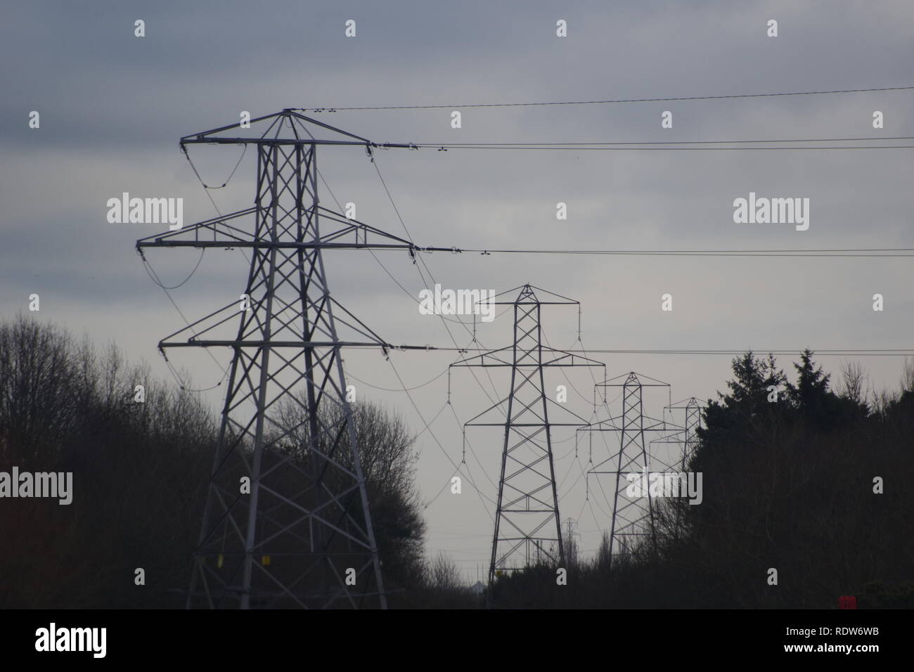 National Grid Electricity Pylons on a Gloomy Winters Day. Exeter, Devon ...