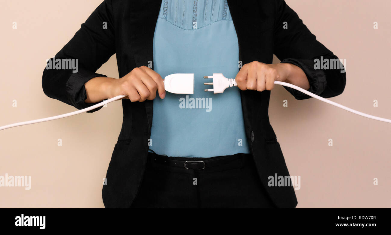 business woman connect two cables Stock Photo - Alamy