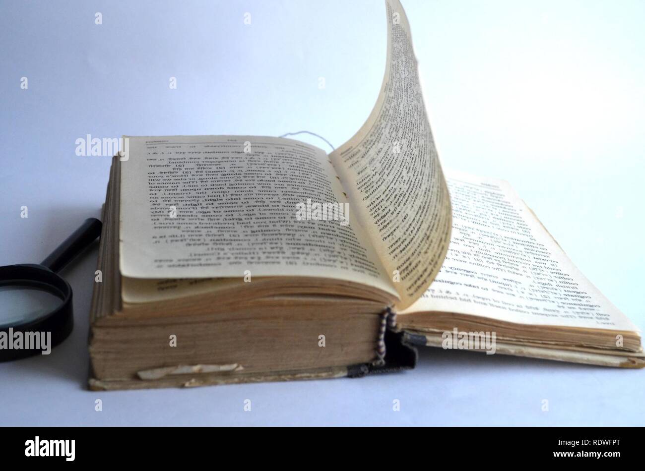 Antique book page turning Stock Photo - Alamy