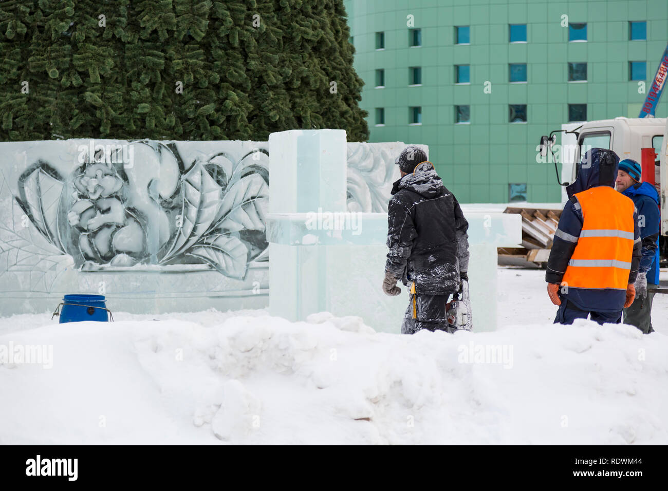 Workers on the construction of an ice camp discuss a plan Stock Photo ...