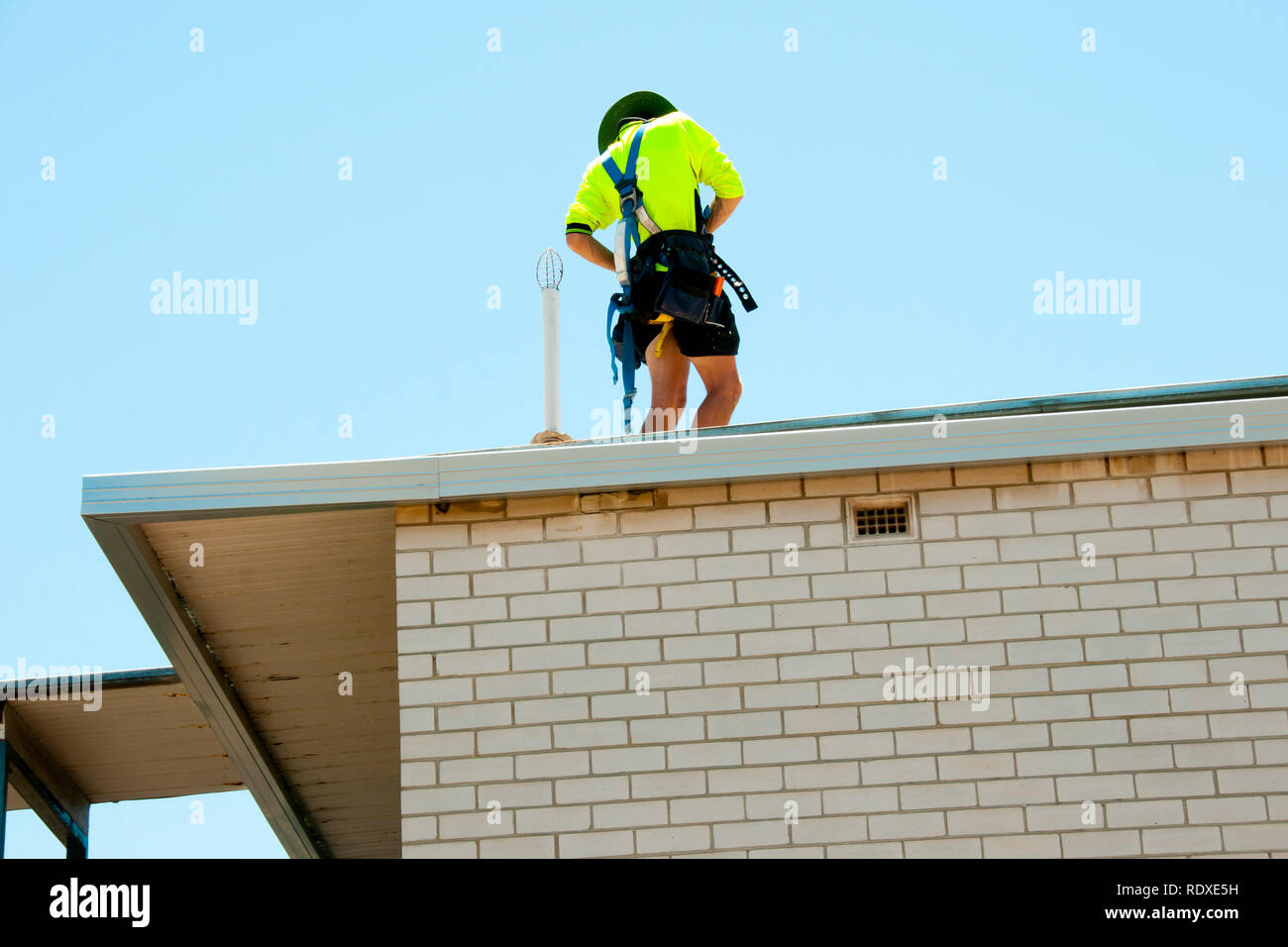 Workman roof hi-res stock photography and images - Alamy