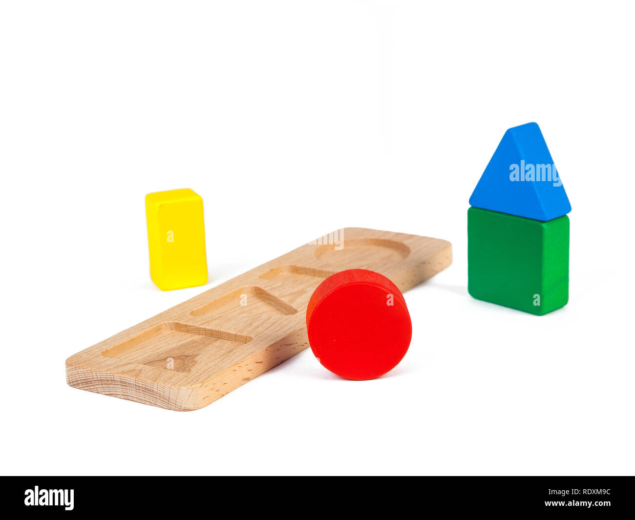 Photo of a wooden toy children's sorter with small wooden details in ...