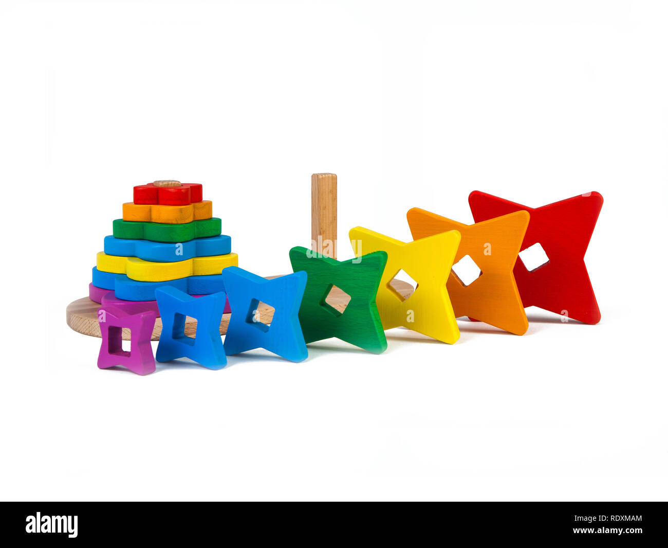 Photo of a wooden toys children's sorter pyramid of colorful parts in ...
