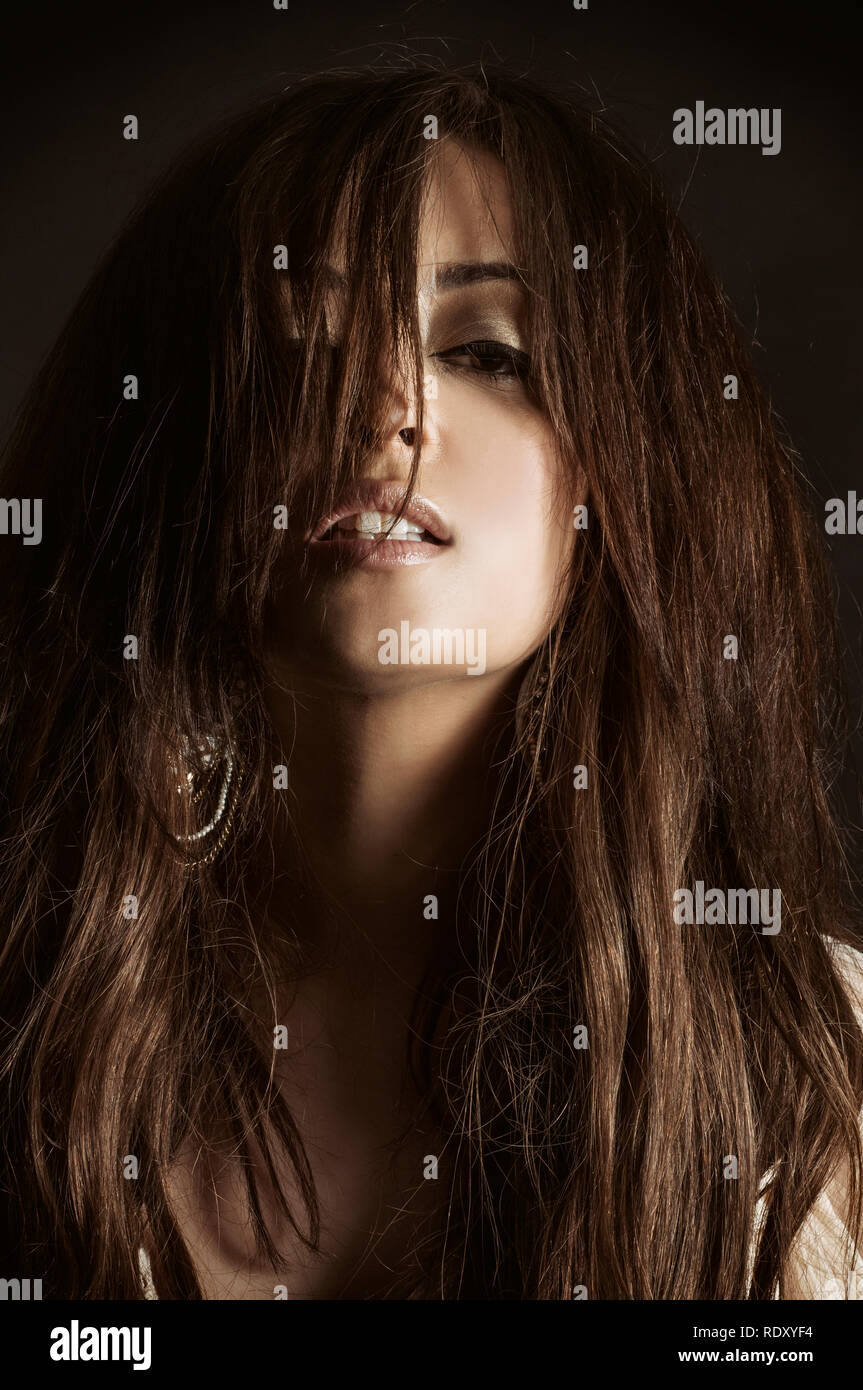 Beautiful woman hair covering face Stock Photo - Alamy