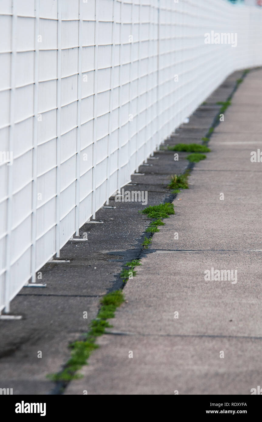 White metal fence Stock Photo - Alamy