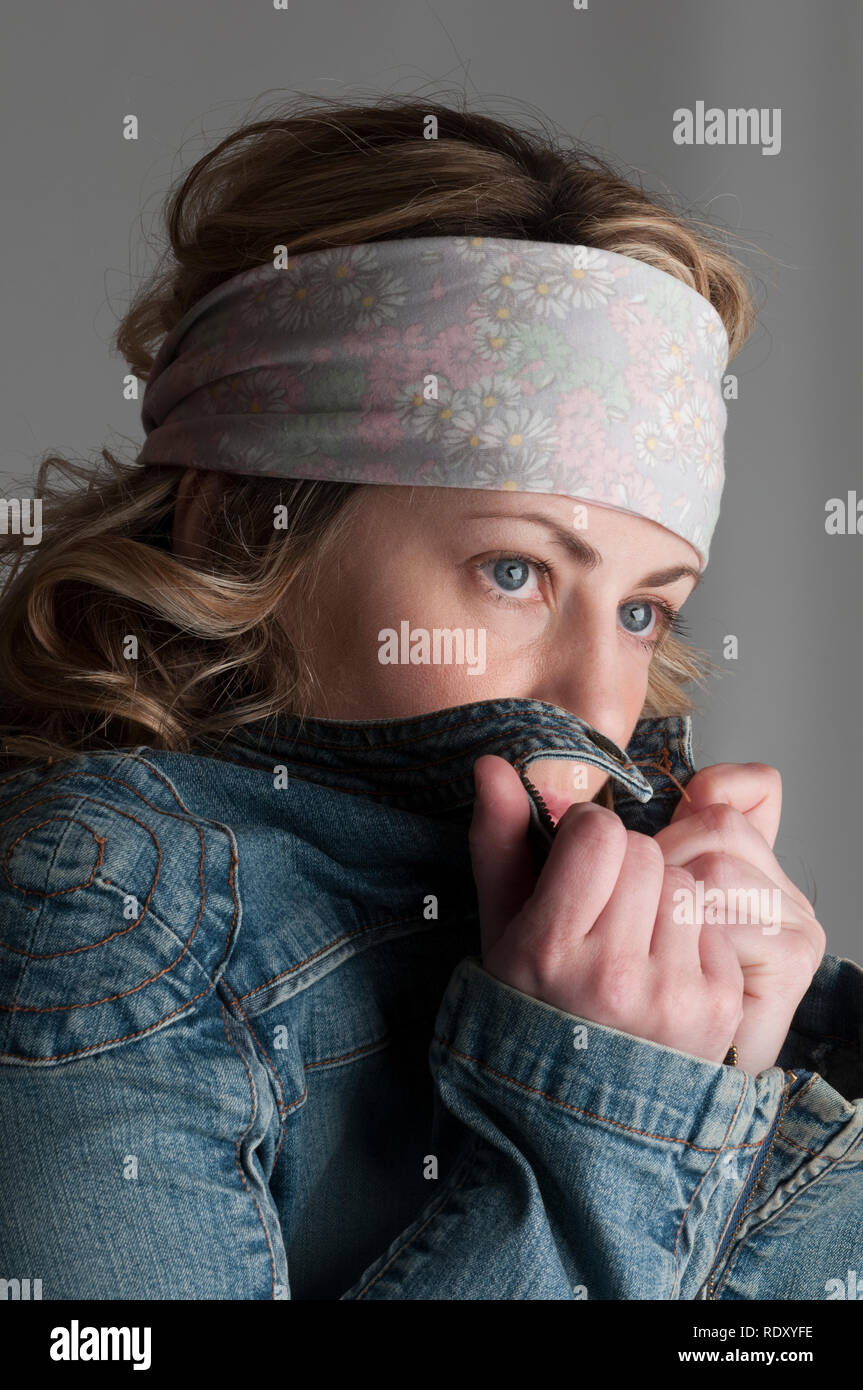 Blonde woman hiding pulling hi-res stock photography and images - Alamy