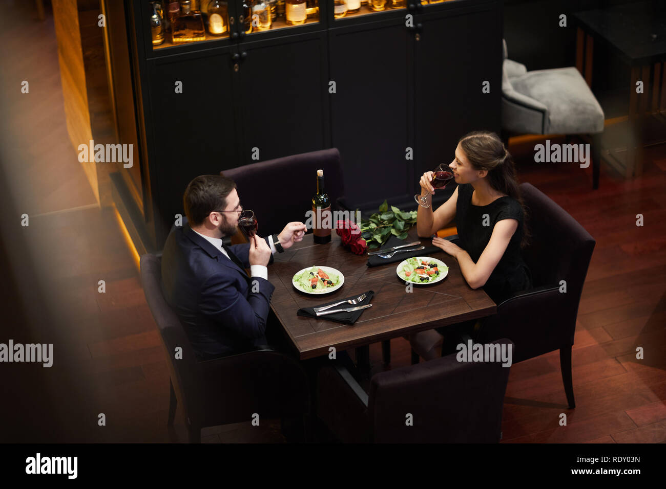 Couple by dinner Stock Photo - Alamy