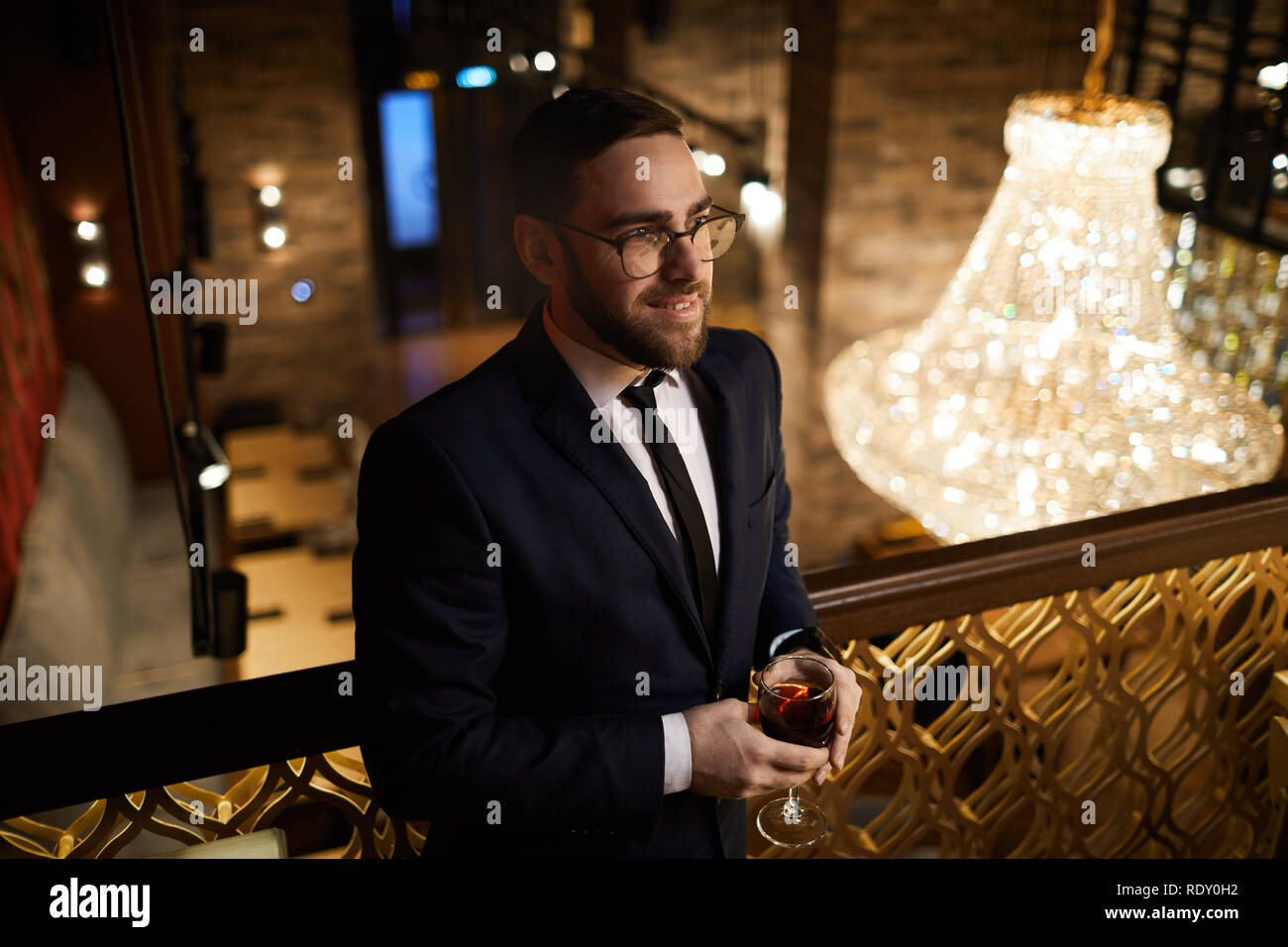 Businessman in restaurant Stock Photo - Alamy