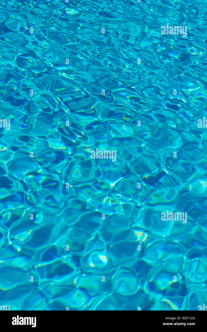 Blue water in swimming pool background. Ripple Water in swimming pool ...
