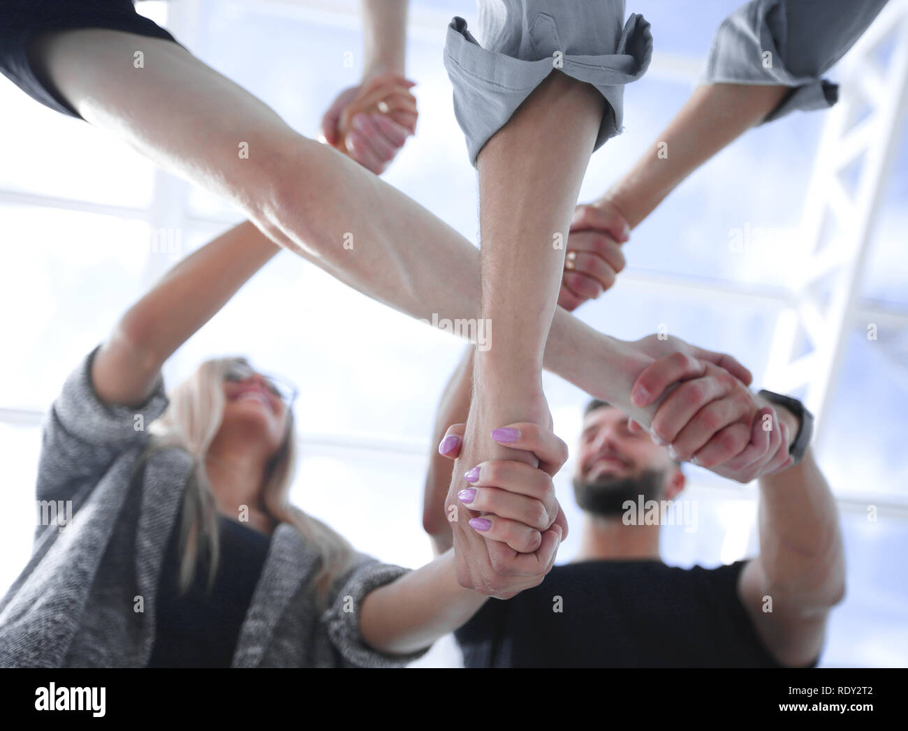 United hands on white background Stock Photo - Alamy