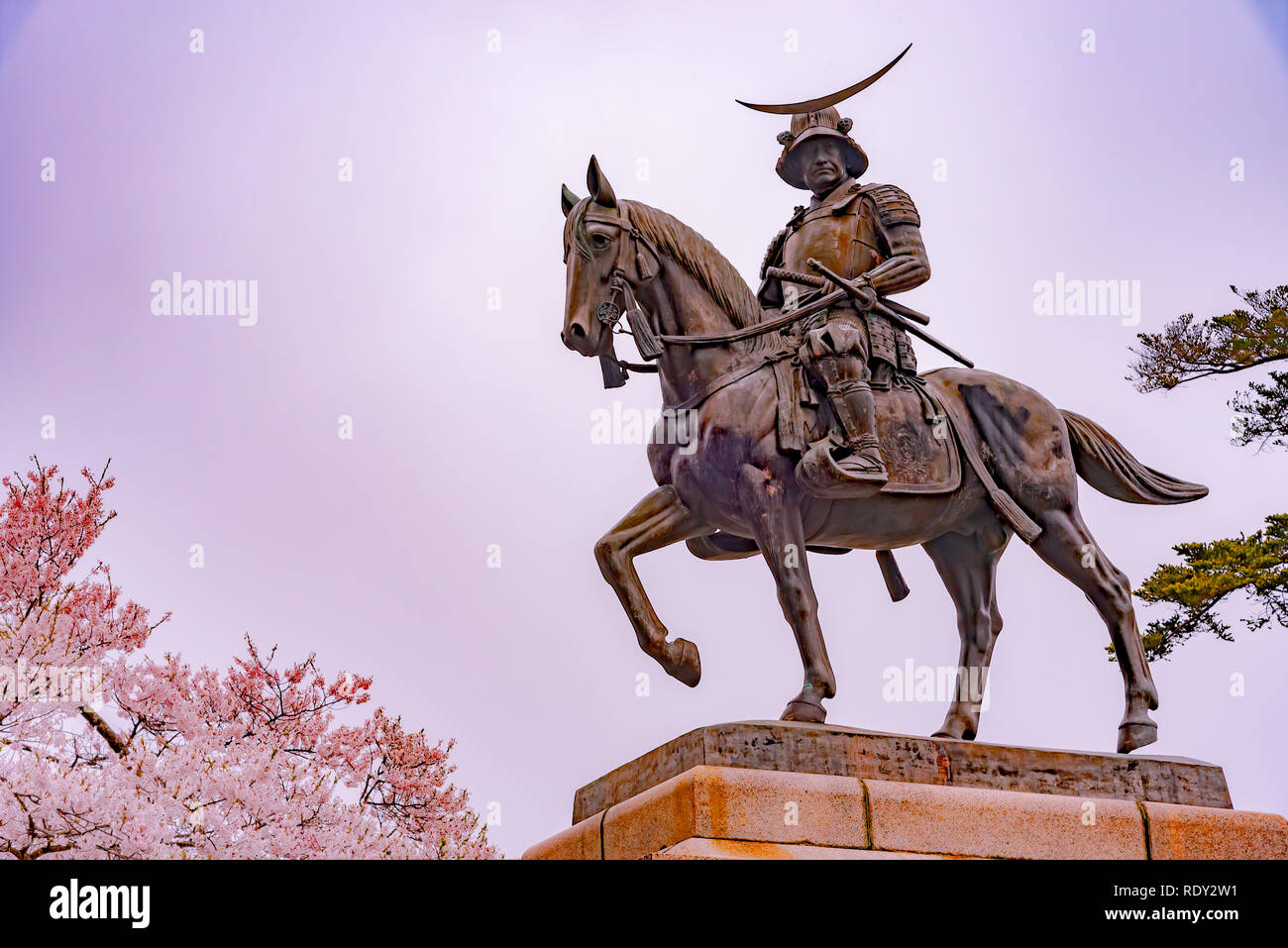 A statue of Masamune Date on horseback entering Sendai Castle in full ...