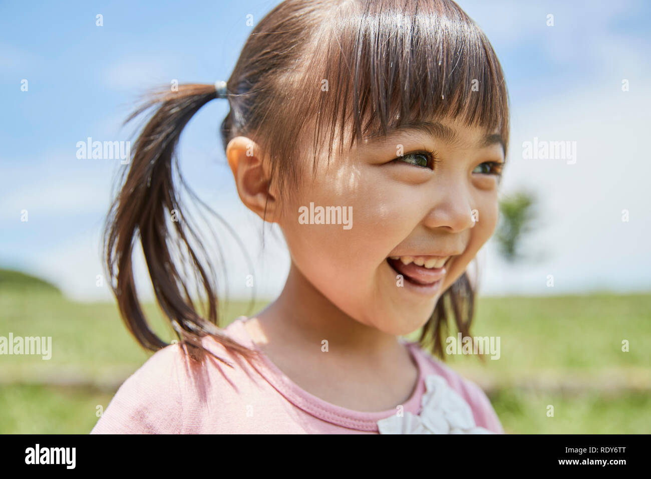 Japanese kid in a city park Stock Photo - Alamy