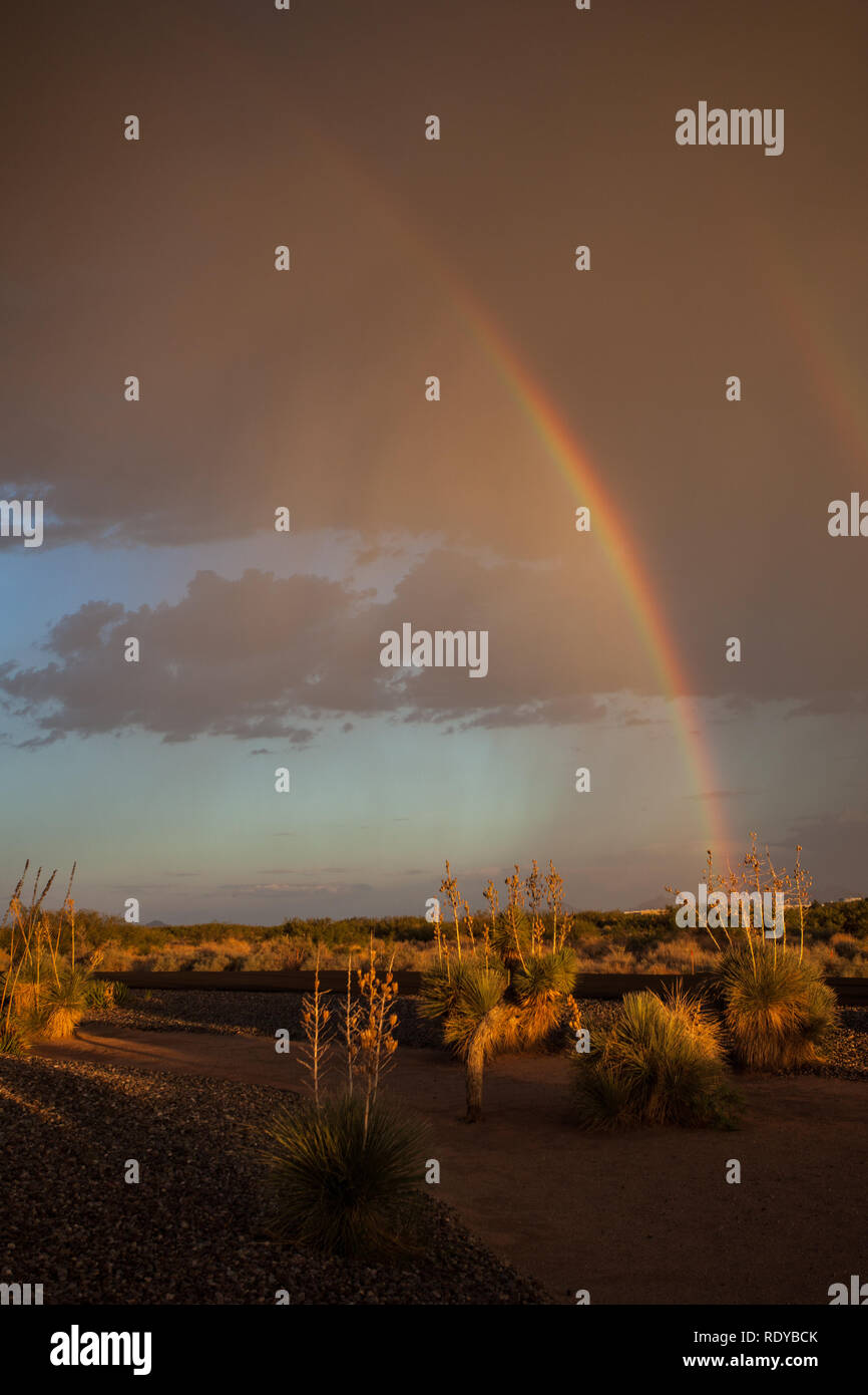 Desert Shower and Rainbow Stock Photo - Alamy