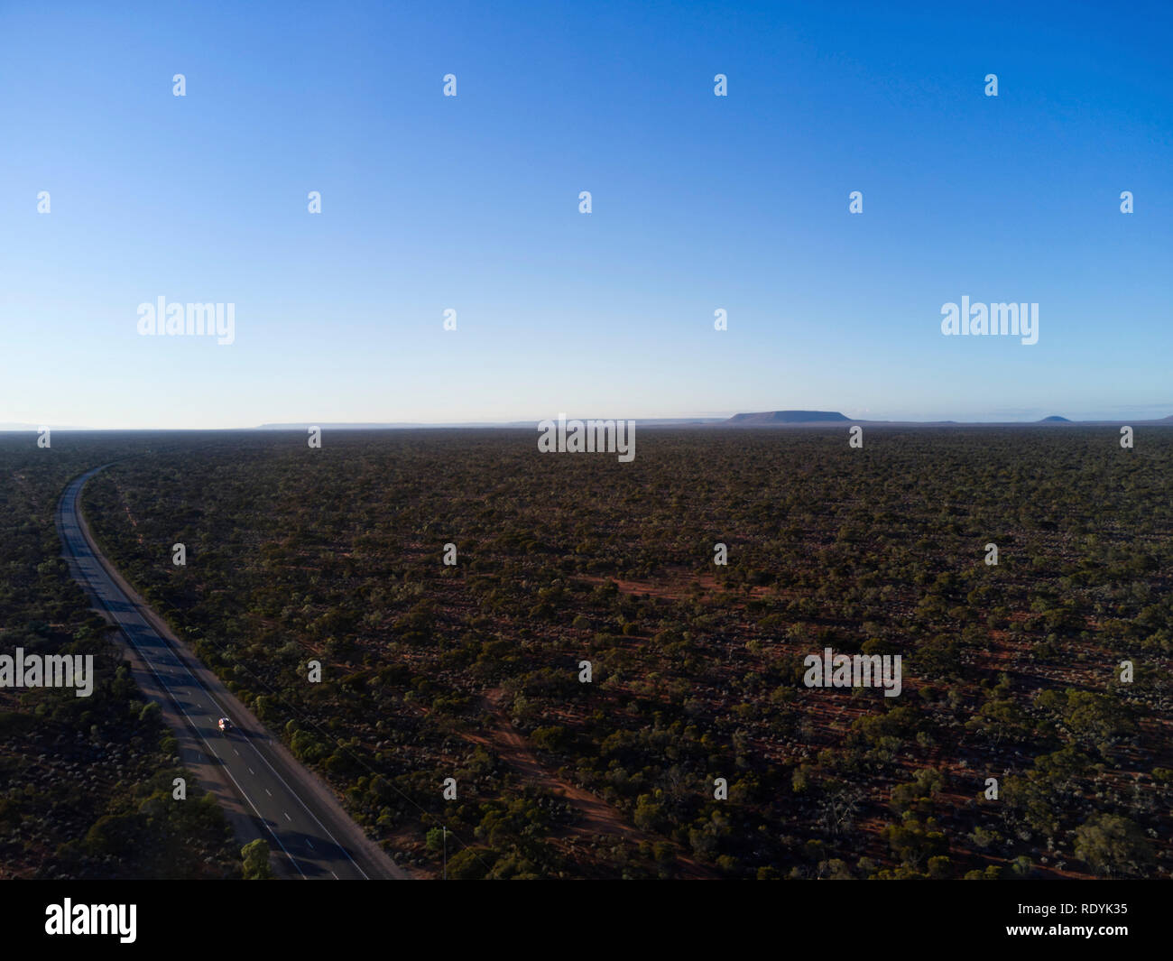 Aerial of the Stuart Highway showing the vast flat horizon of the ...
