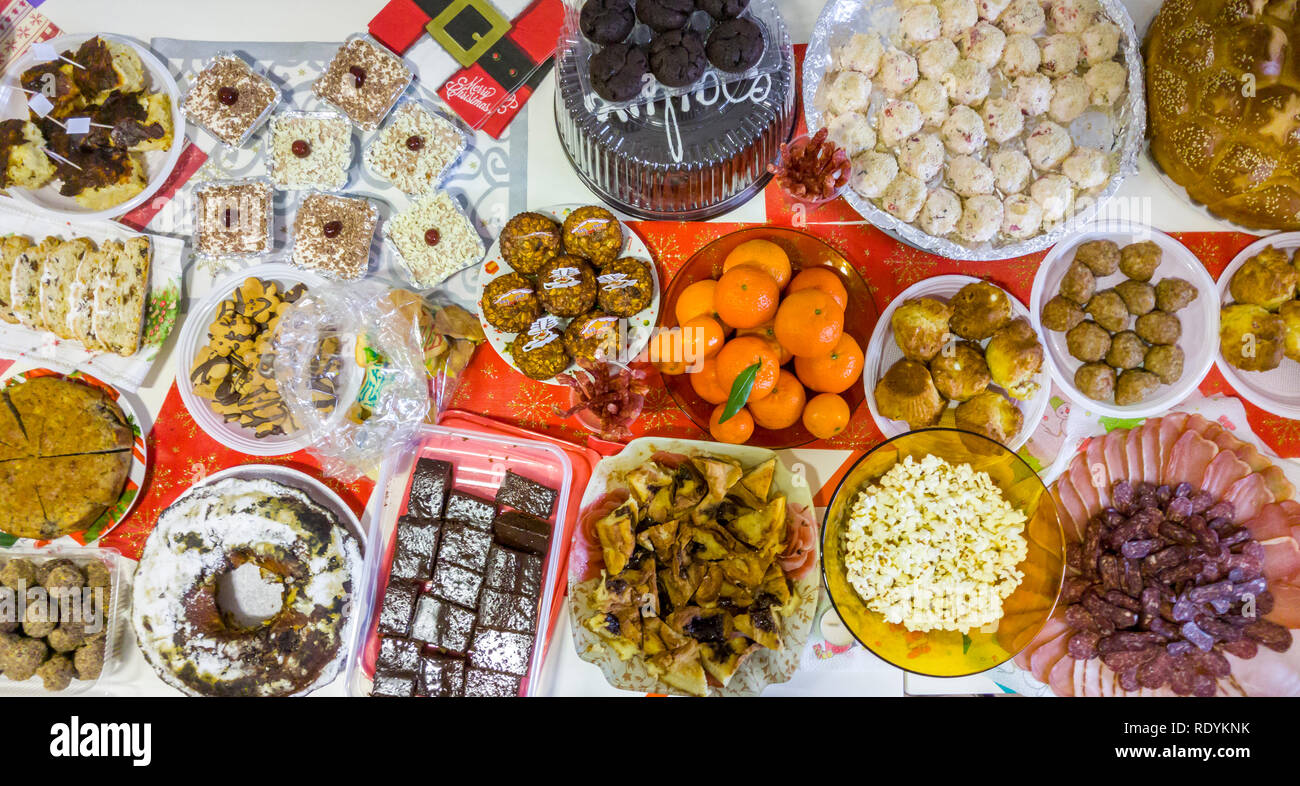 Top view of rich table spread with many different dishes, fruits and ...