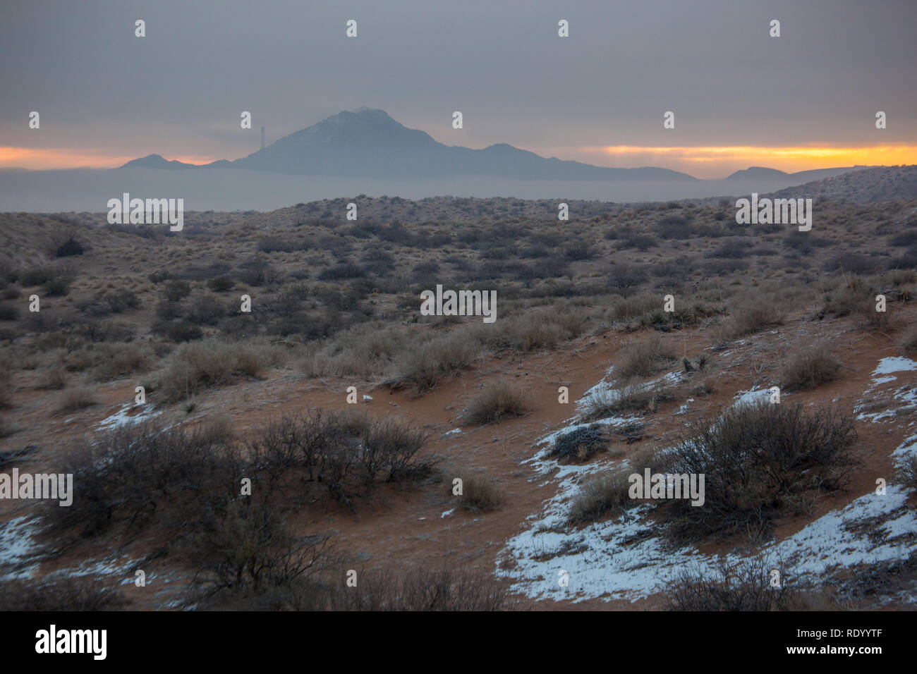 Patches of Snow in the Chihuahuan Desert at Sunrise with Mount Cristo ...