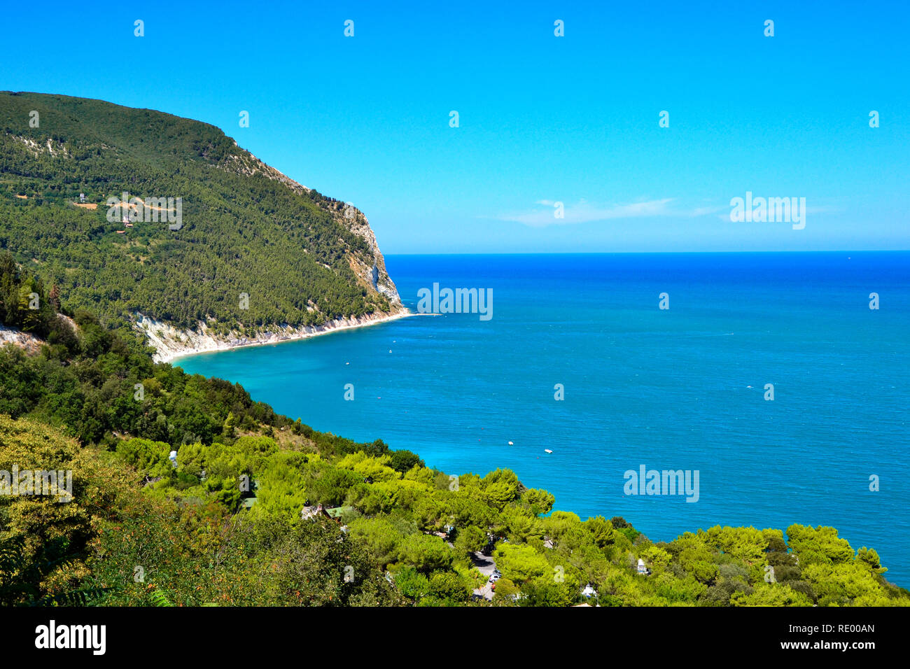 Top view of Numana beach, Monte Conero, during a summer day with blue ...