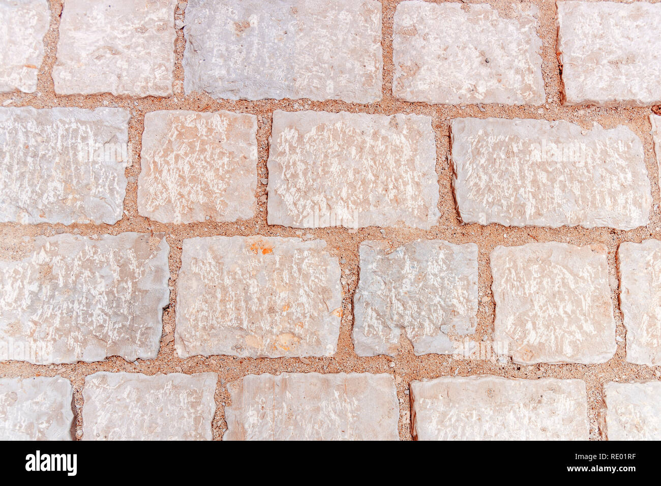 Red marble block like industrial natural city road Stock Photo - Alamy