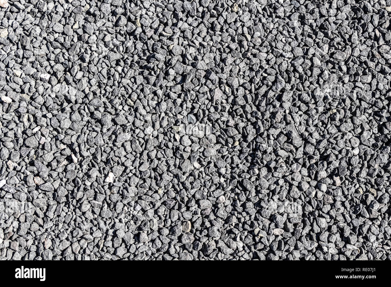 Surface of a decorative path from gray gravel Stock Photo - Alamy
