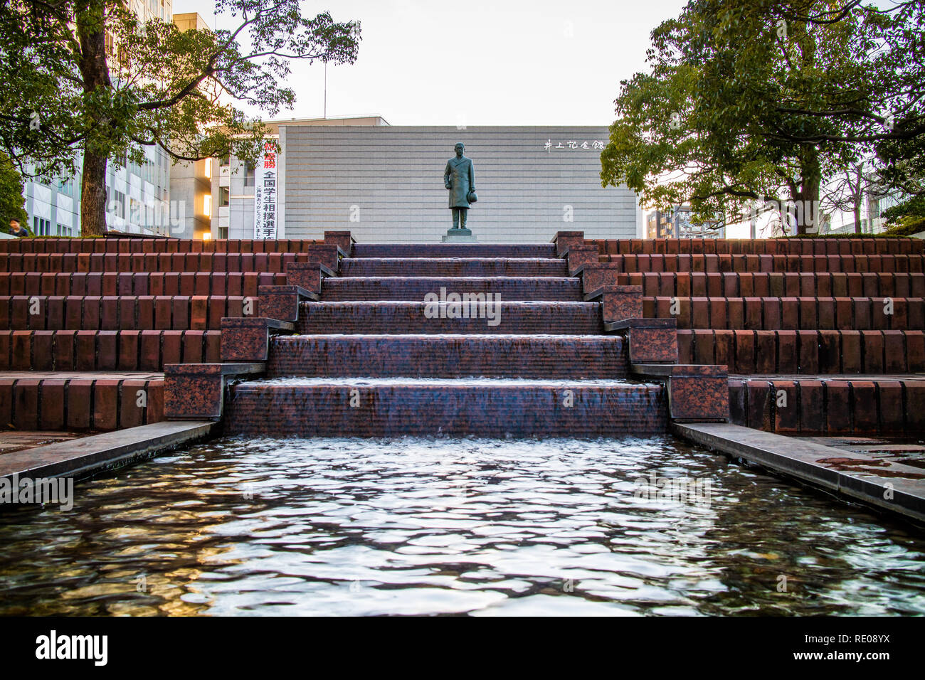 Tokyo, Japan - 17/1/2017: The Statue of Inoue Enryo in front of one of ...