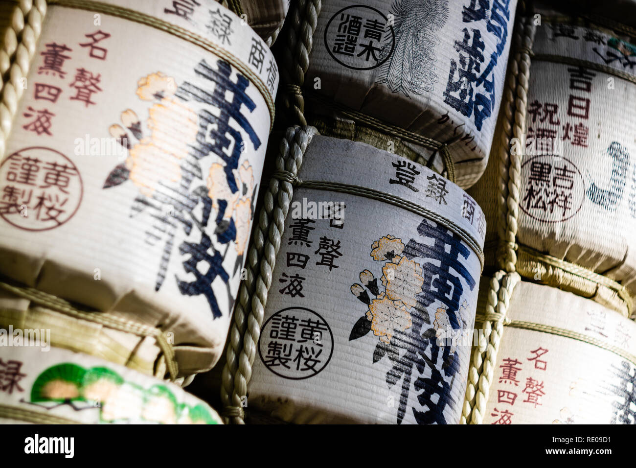 Tokyo, Japan - 17/2/2017: Stacked Japanese sake barrels on the path ...