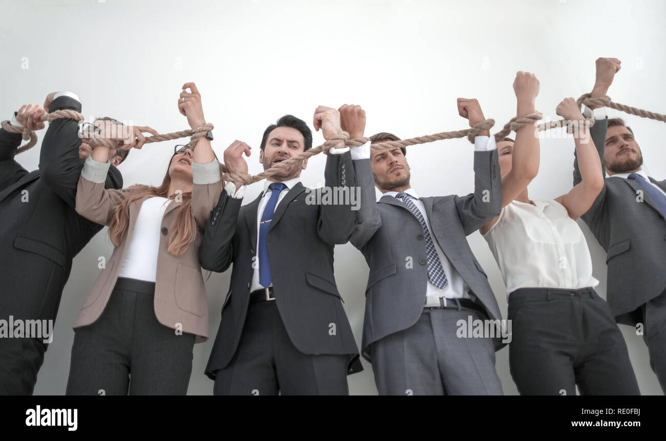 people pulling and connected with the concept of a rope Stock Photo - Alamy