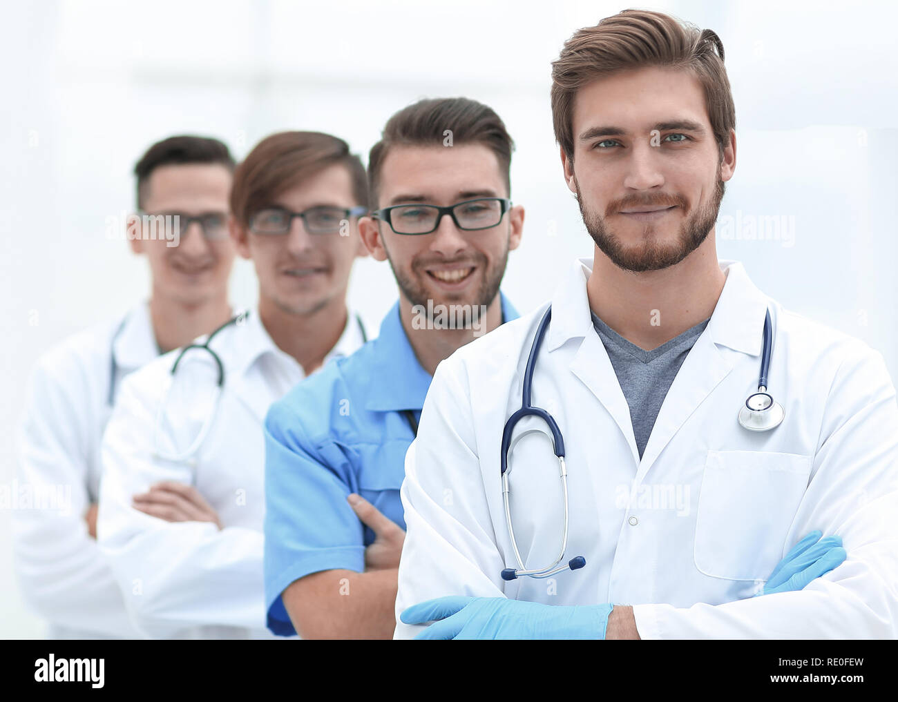 group of doctors standing at the medical office Stock Photo - Alamy