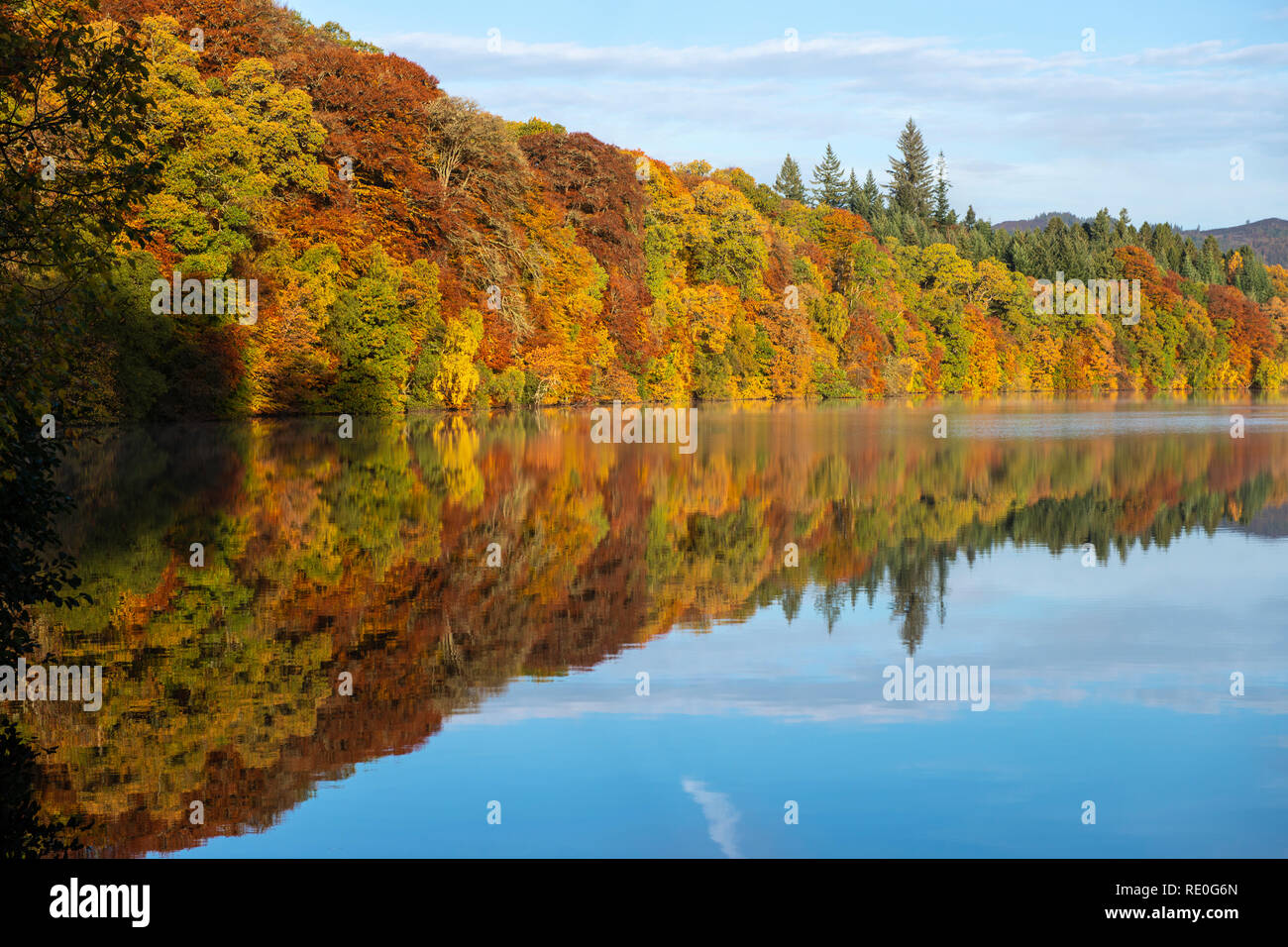 Autumn reflections on Loch Faskally near Pitlochry, Perthshire ...