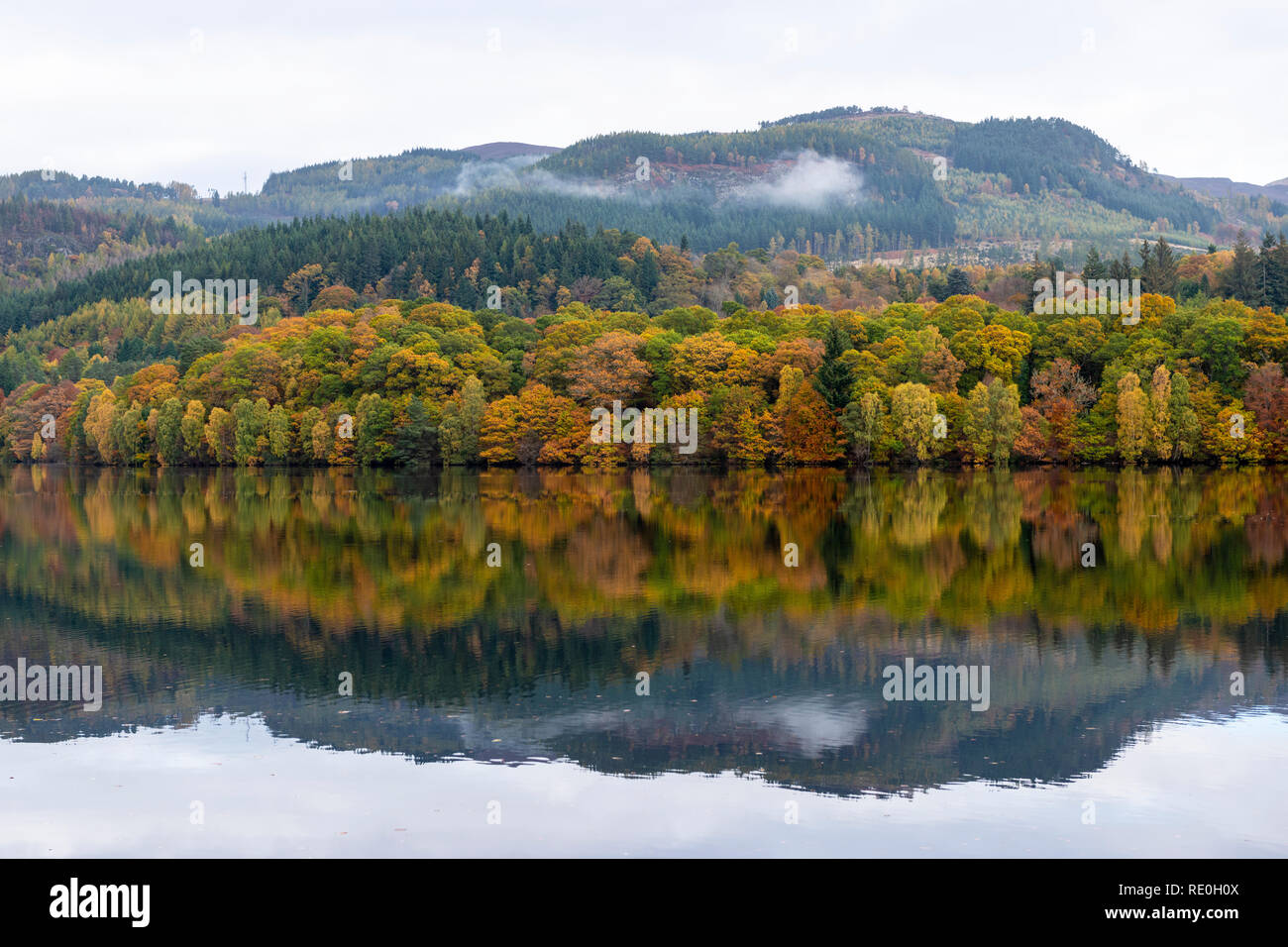 Autumn reflections on Loch Faskally near Pitlochry, Perthshire ...
