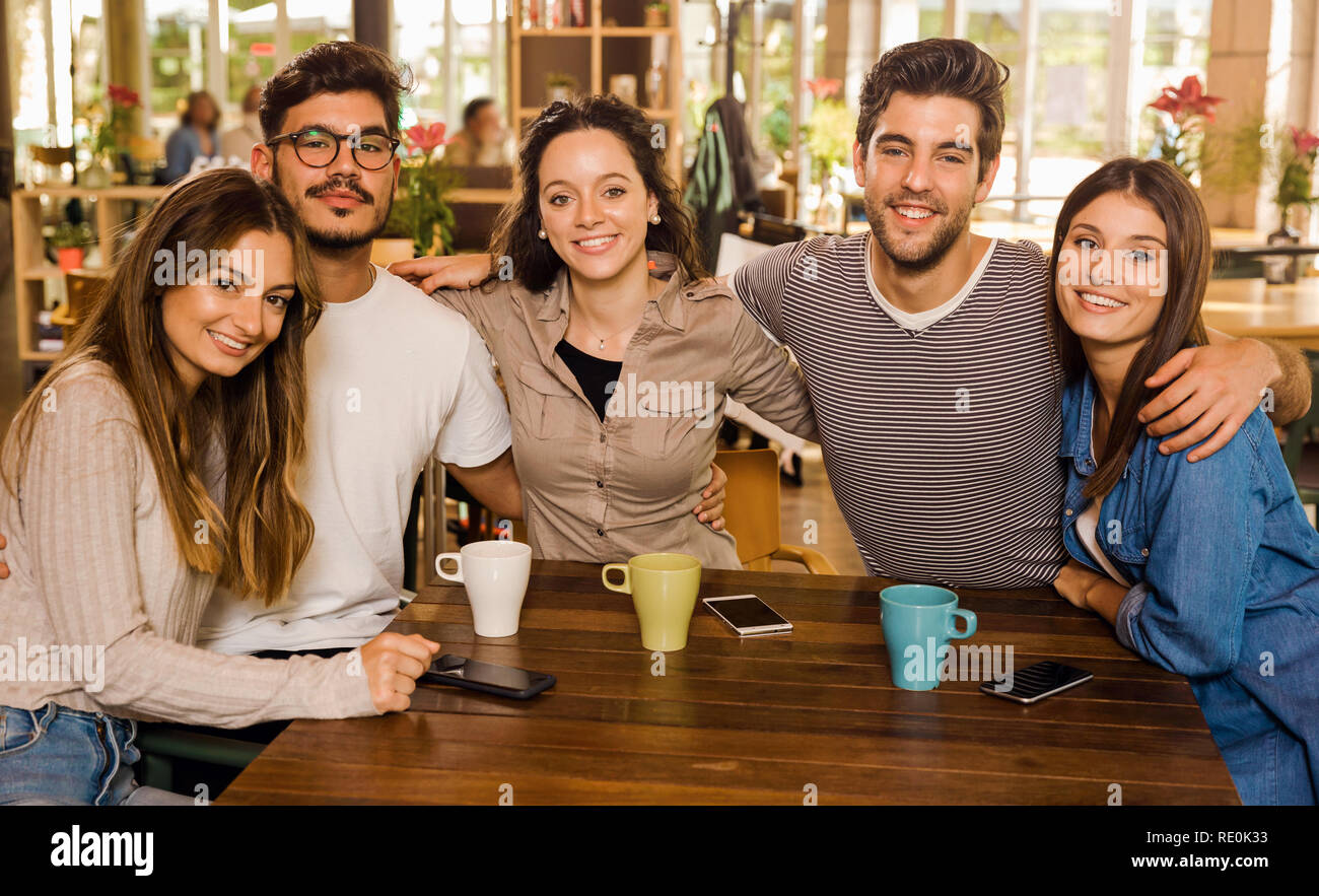 Posing coffeeshop hi-res stock photography and images - Alamy
