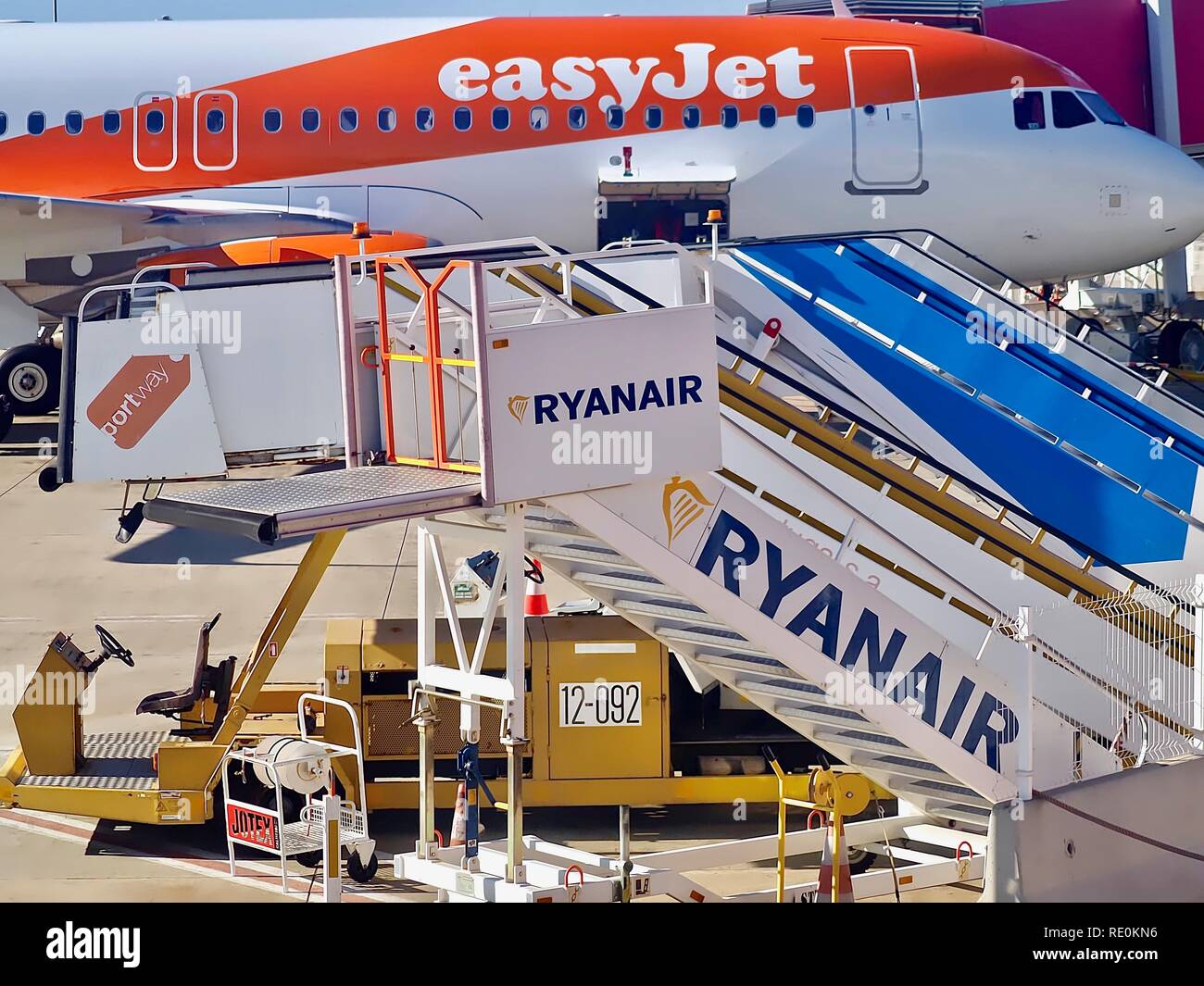 Airplane and gangways at an Airport Stock Photo - Alamy